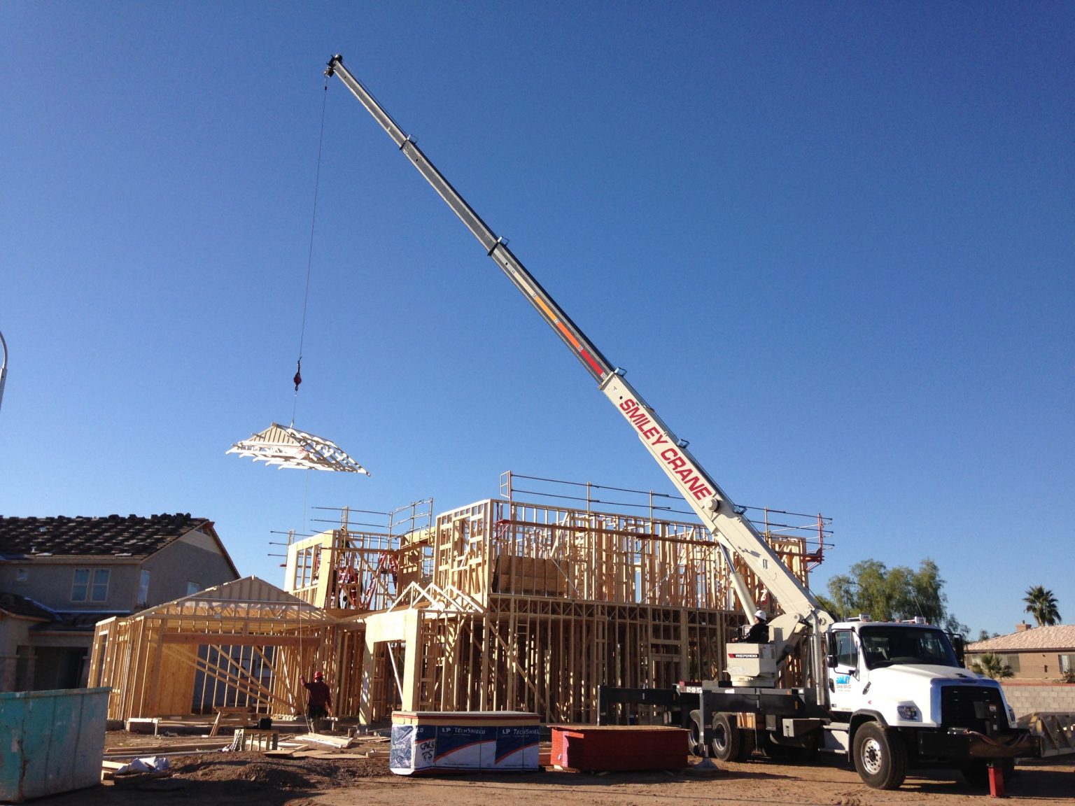 Smiley Crane Service Light Commercial & Residential Lifts